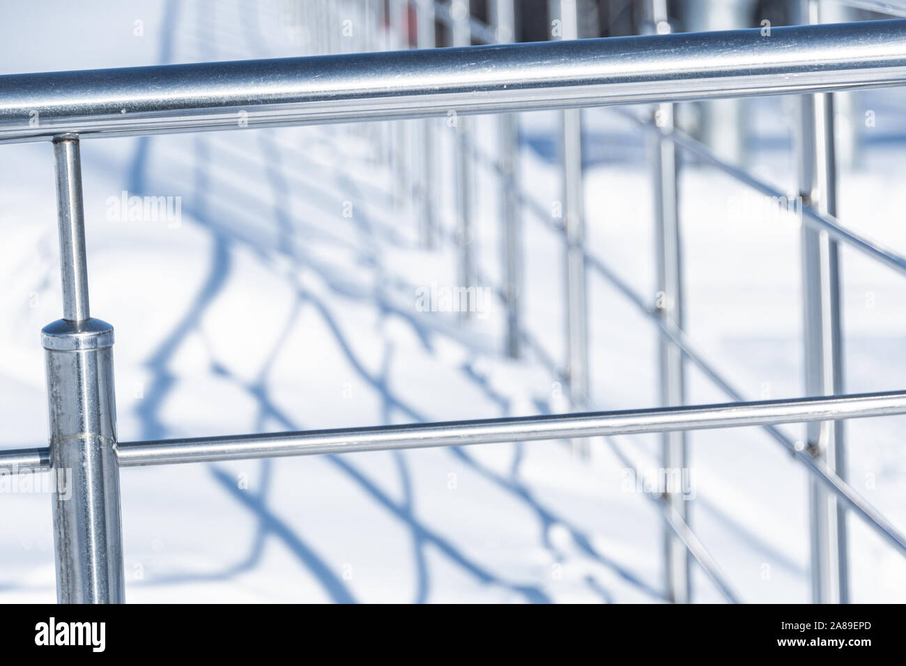 Metal handrail on winter stairs. Dangerous stairs under snow, safe ...