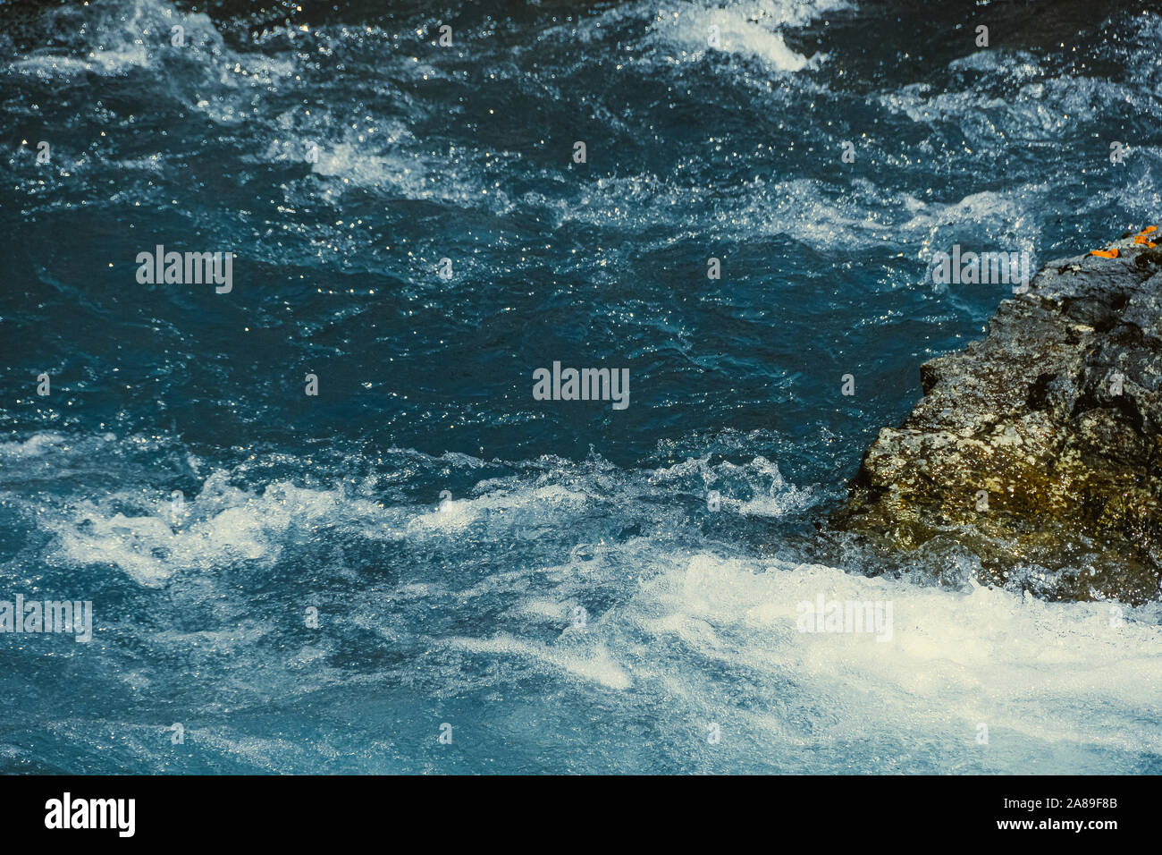 Mountain stream flowing into sea hi-res stock photography and images ...