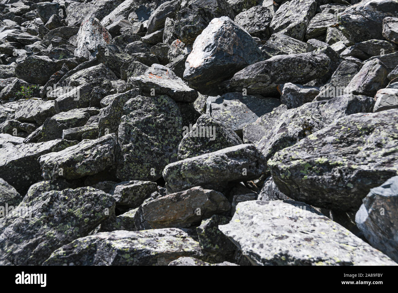 Dump of stones for construction. Stone quarry with boulders. Mountain ...