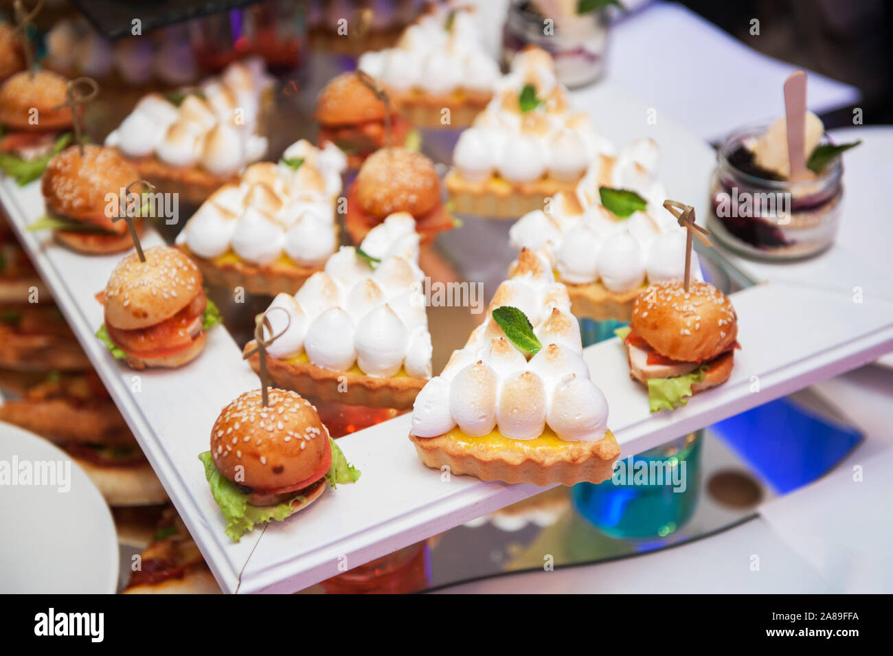 Catering food table set Stock Photo - Alamy