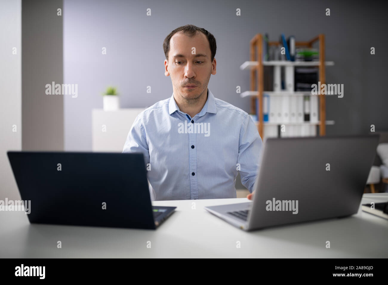 Multiple laptops hi-res stock photography and images - Alamy