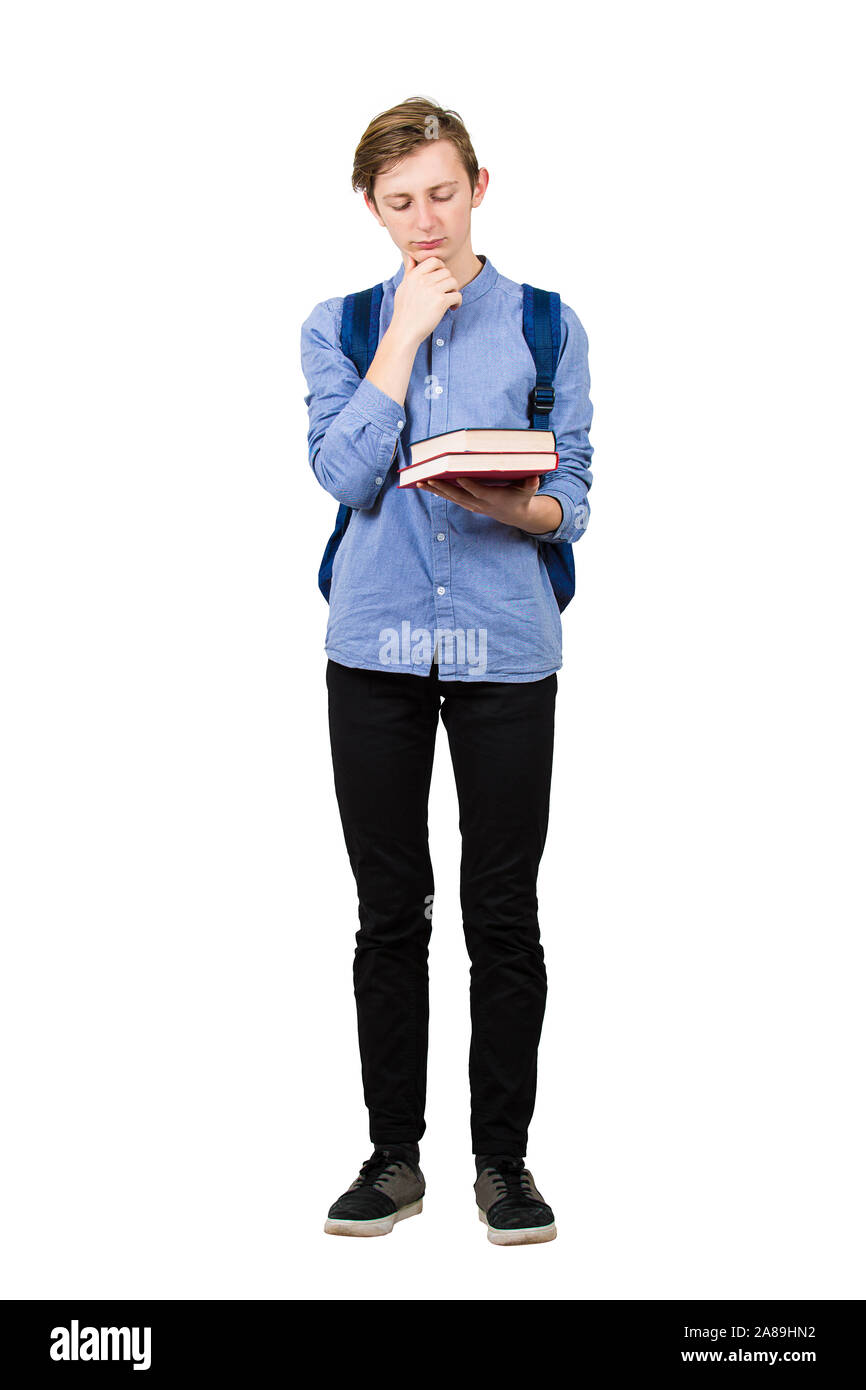Thoughtful student guy full length portrait holding textbooks looking ...