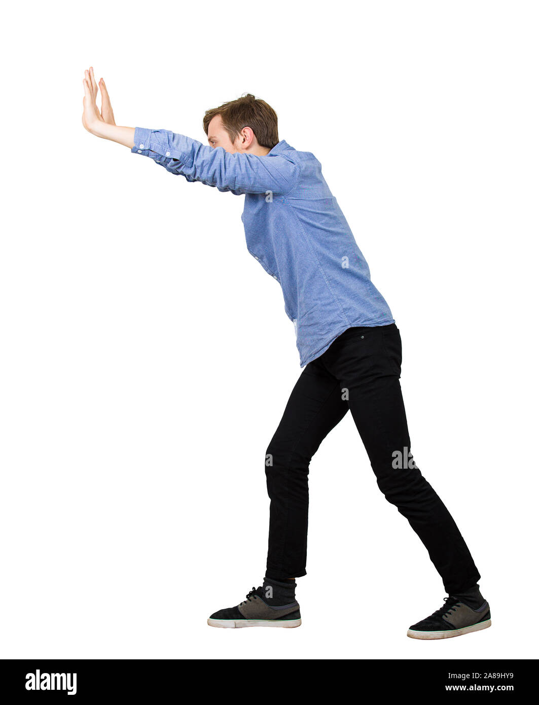 Boy pushing heavy Cut Out Stock Images & Pictures - Alamy