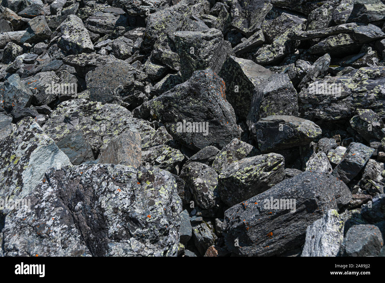 Dump of stones for construction. Stone quarry with boulders. Mountain ...