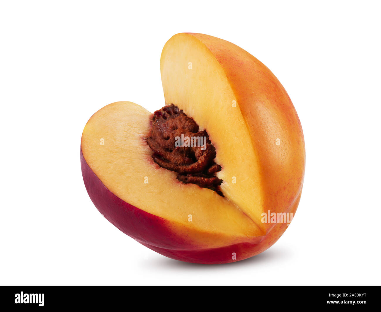 Smooth-skinned, delicious nectarine fruit with kernel isolated on white ...