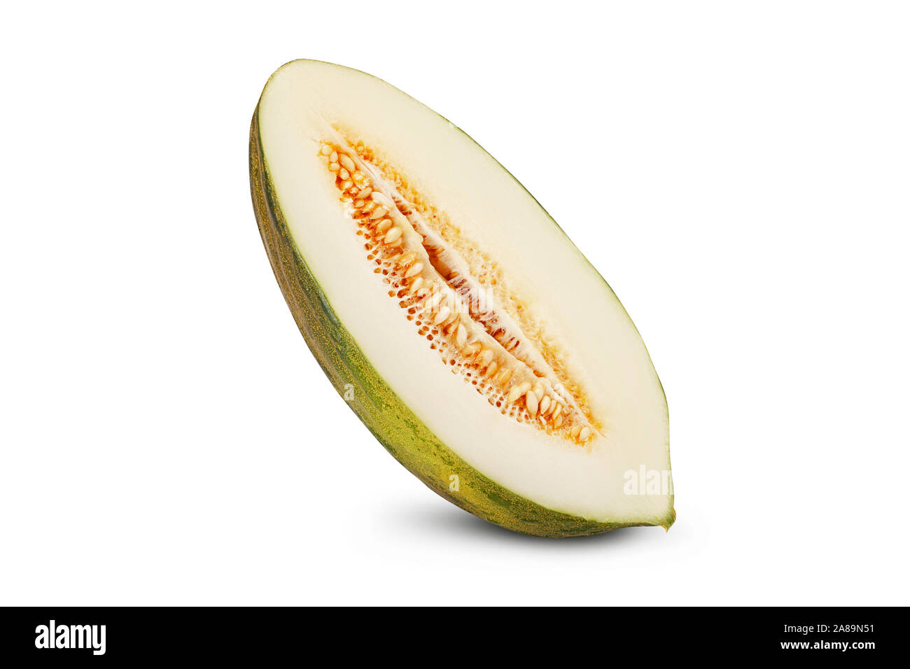 Half of a delicious, sappy green tendral melon in a cross-section ...