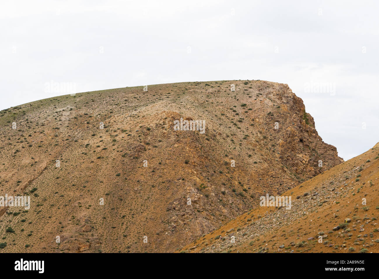 Red hills in canyon. Red colored rocks. Old bed of river in gorge Stock ...