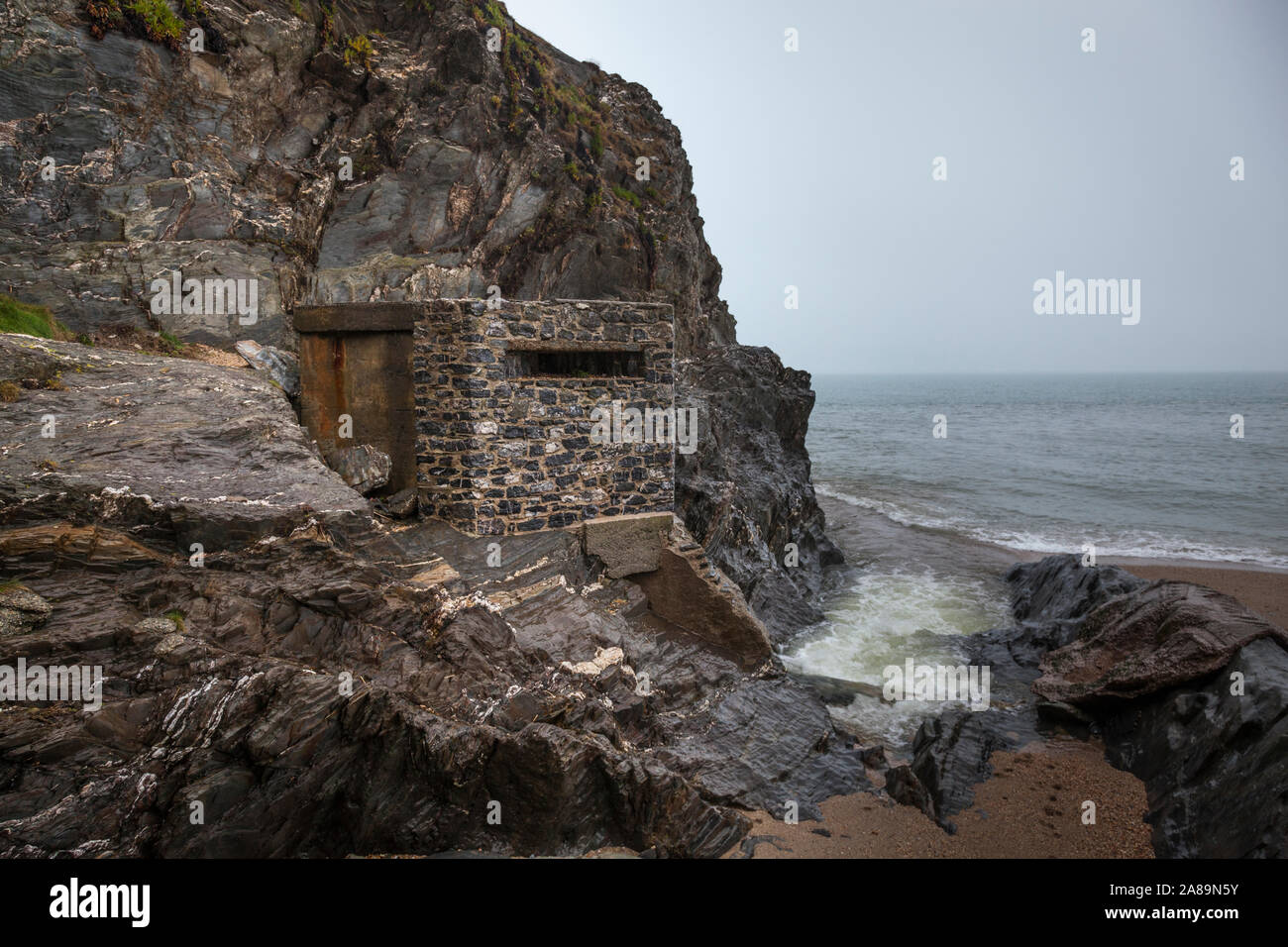 A WWII pillbox at the foot of cliffs at Torcross, Devon Stock Photo - Alamy