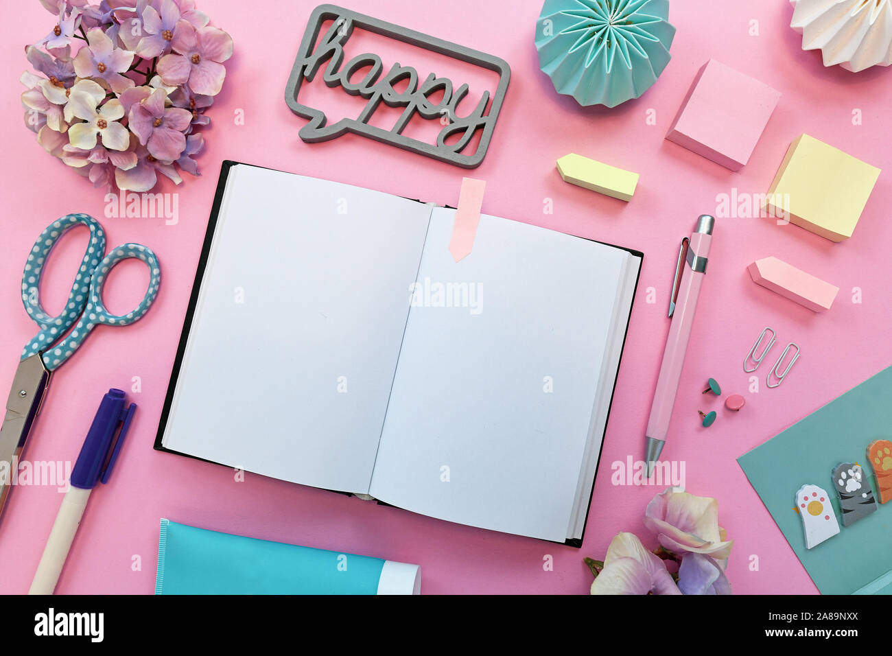 Top view flat lay with various colorful office supplies like pencils ...