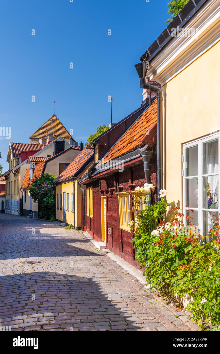 A street view with homes and buildings featuring the architecture of ...