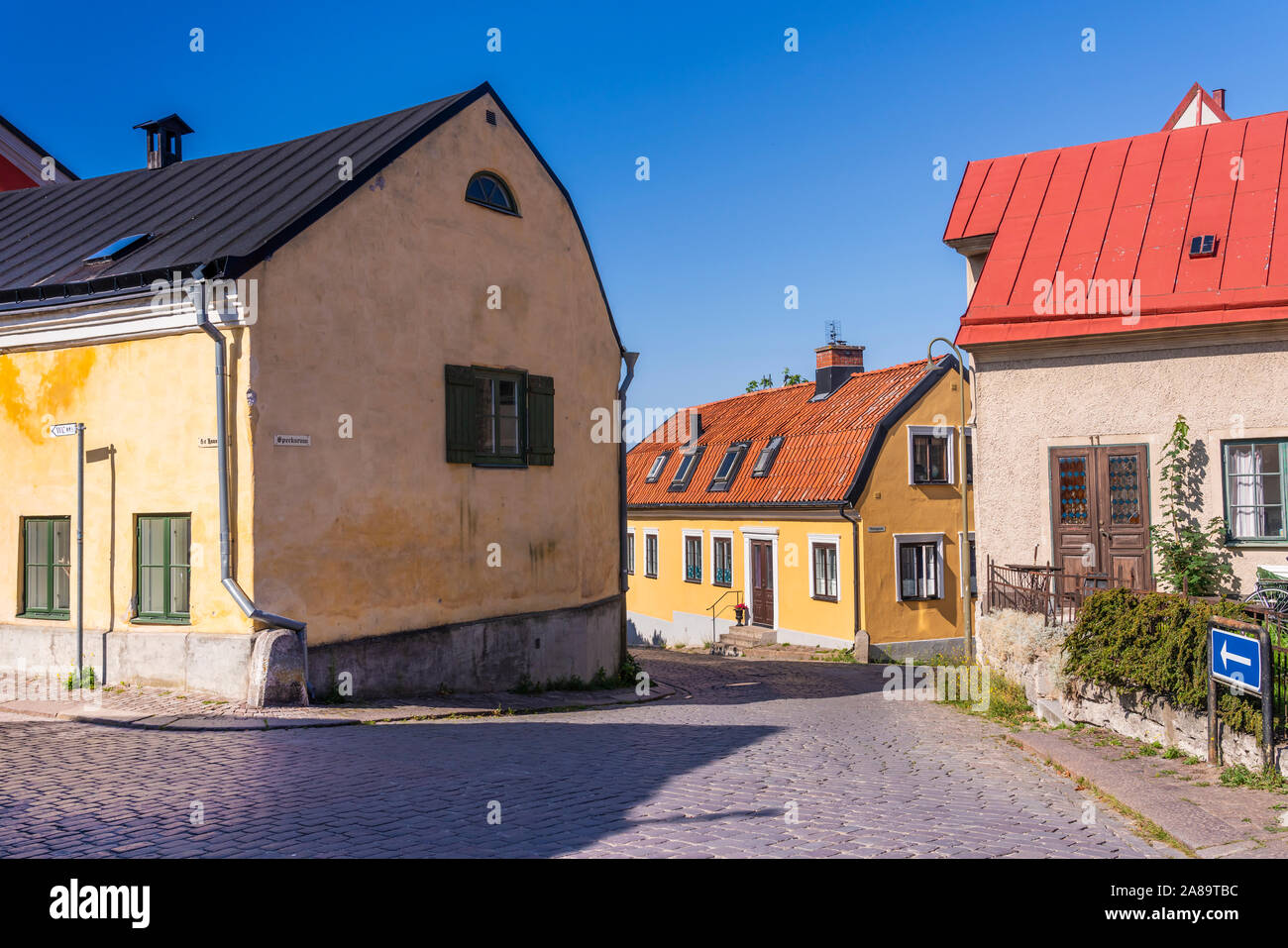 A street view with homes and buildings featuring the architecture of ...