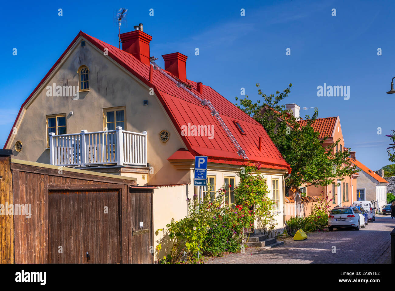 A street view with homes and buildings featuring the architecture of ...