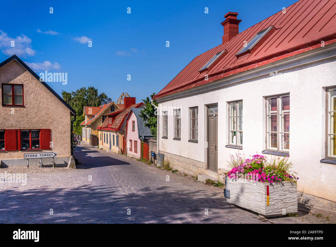 A street view with homes and buildings featuring the architecture of ...