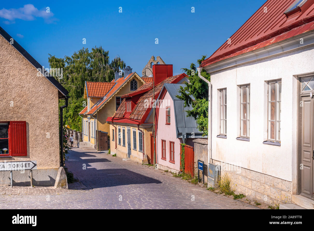 A street view with homes and buildings featuring the architecture of ...