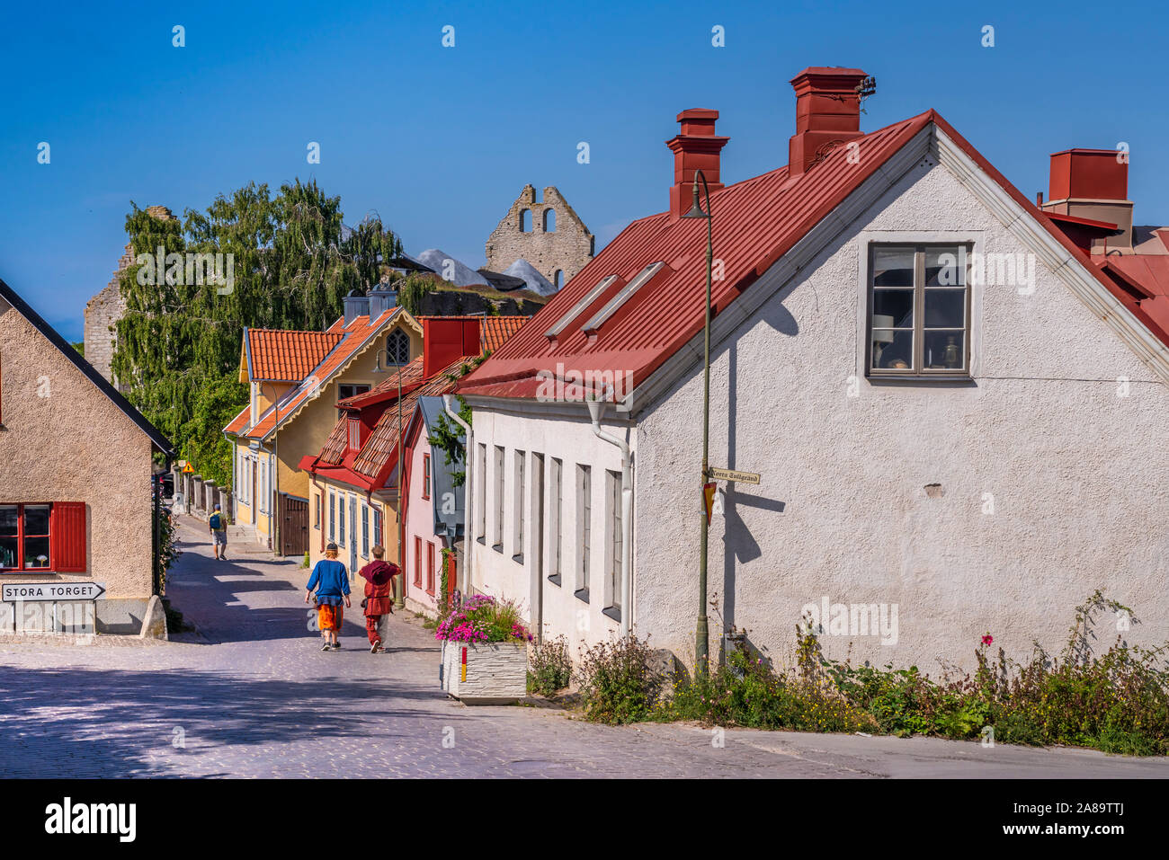 A street view with homes and buildings featuring the architecture of ...