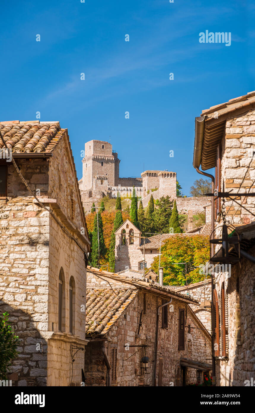 Assisi charming medieval historic center with fortress ruins at the top ...