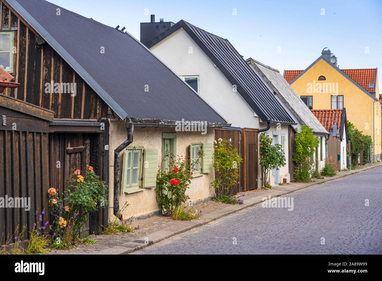 A street view with homes and buildings featuring the architecture of ...