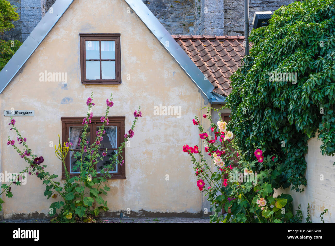 A street view with homes and buildings featuring the architecture of ...