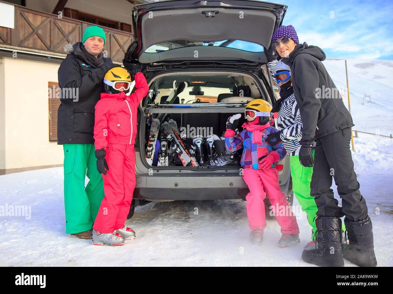 Family on the winter vacation Stock Photo - Alamy