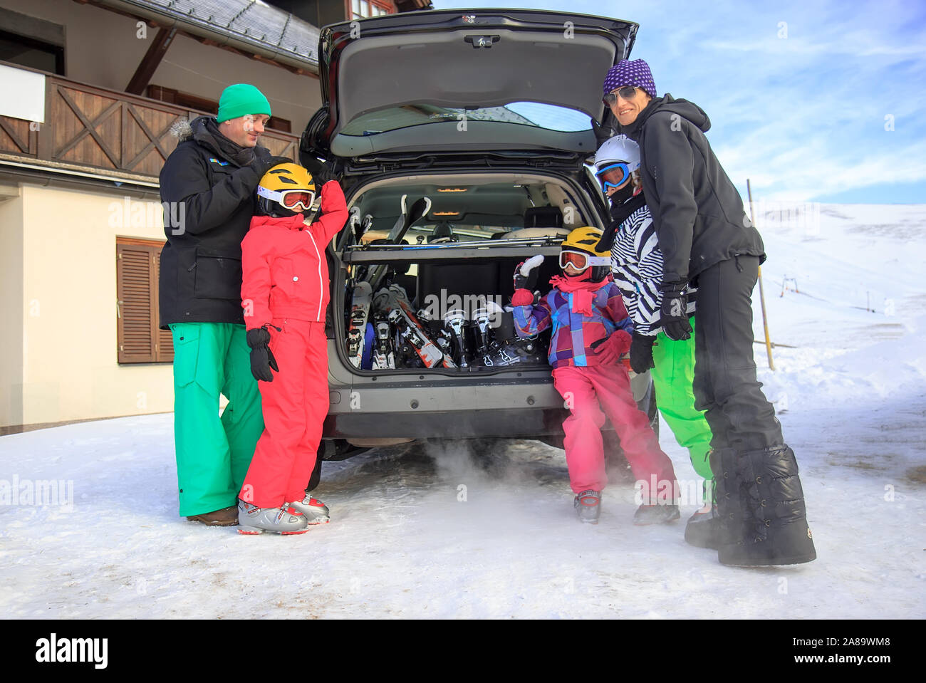 Family on the winter vacation Stock Photo - Alamy