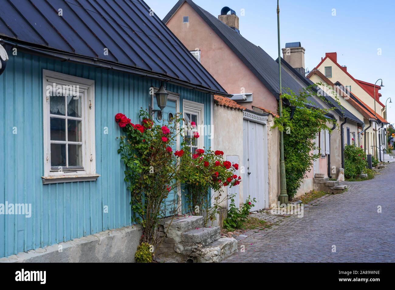 A street view with homes and buildings featuring the architecture of ...
