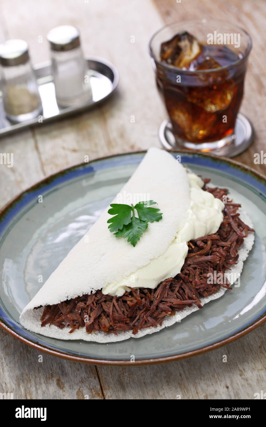 tapioca crepe , carne seca, brazillian food Stock Photo - Alamy