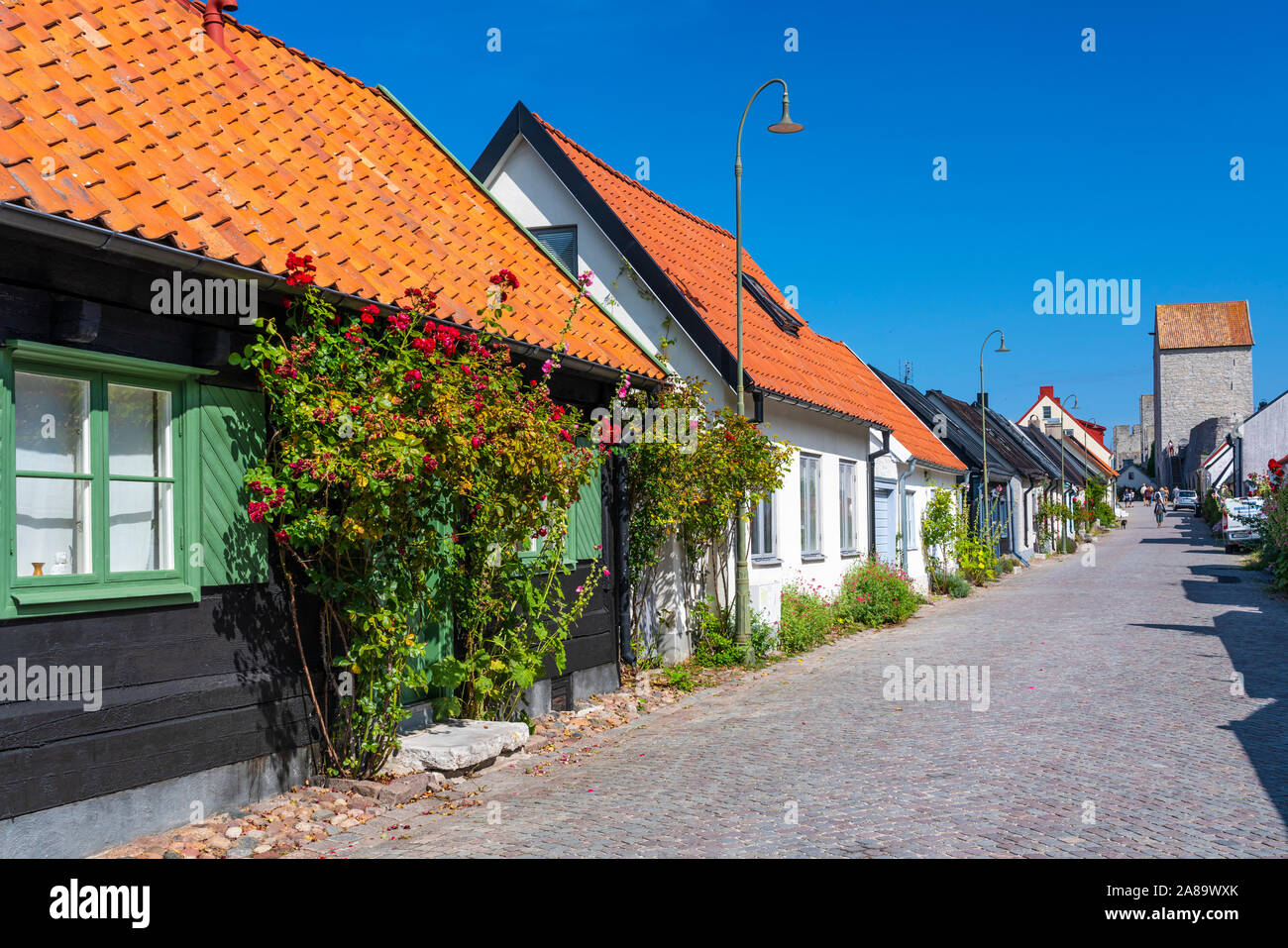 A street view with homes and buildings featuring the architecture of ...