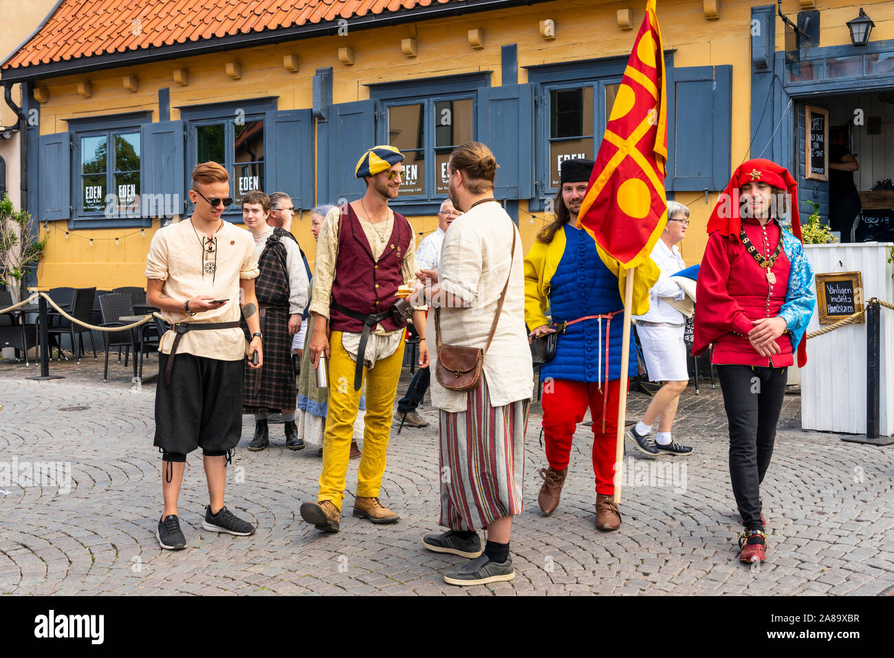 Residents in period dress celebrate Medieval Week in Visby, Gotland ...