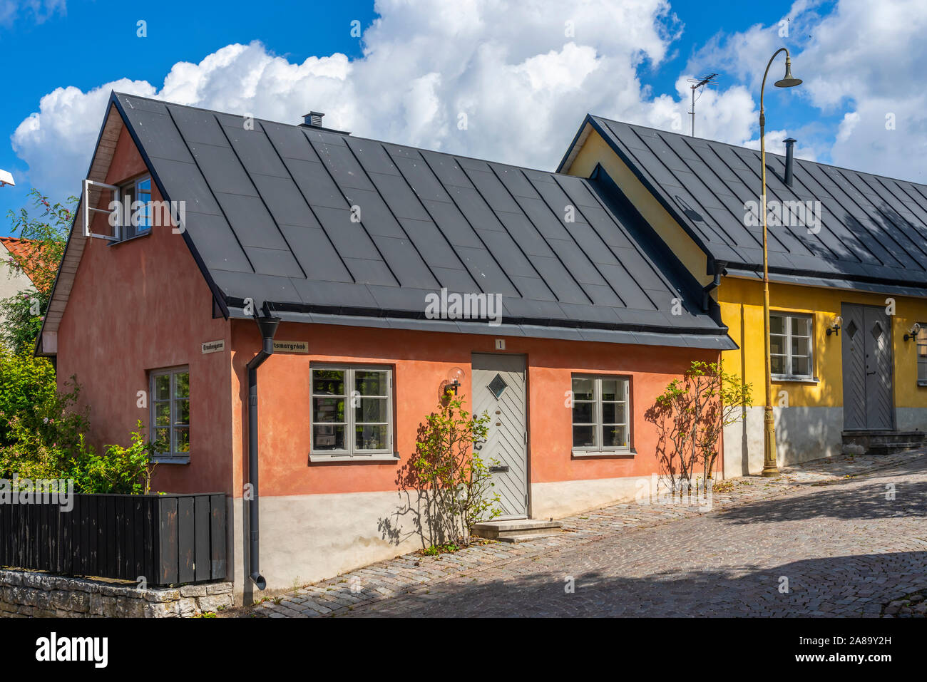A street view with homes and buildings featuring the architecture of ...