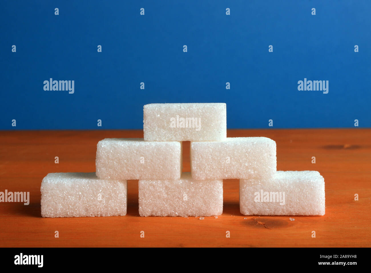 Composition of sugar cubes in the shape of a brick wall Stock Photo - Alamy