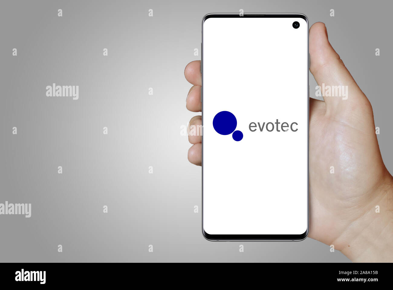 Logo of public company Evotec displayed on a smartphone. Grey ...