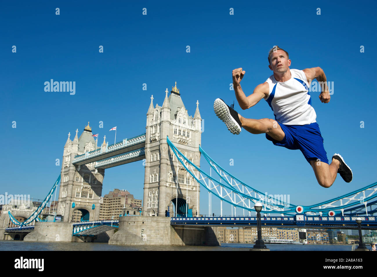 Hurdler in mid air hi-res stock photography and images - Alamy