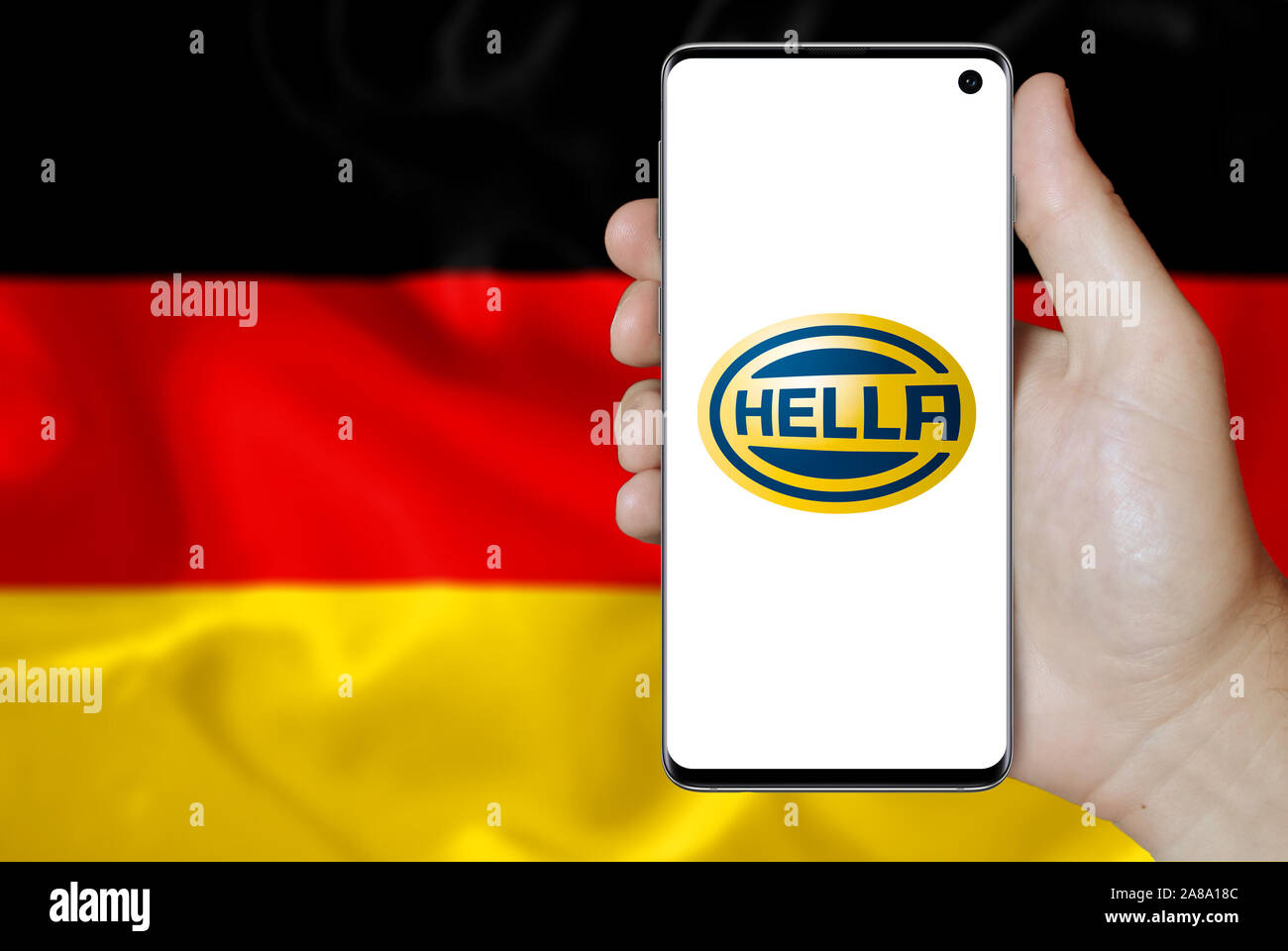 Logo of public company Hella KGaA Hueck & Co. displayed on a smartphone ...