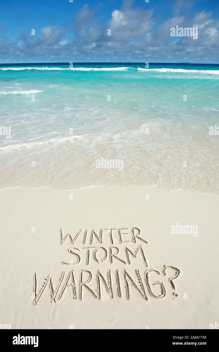 Cheeky Winter Storm Warning? message handwritten on tropical beach to ...
