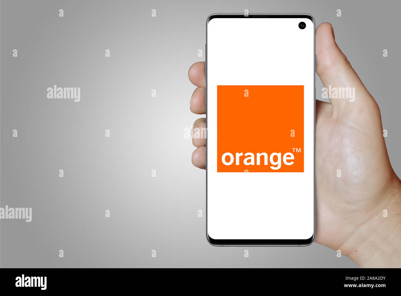Logo of public company Orange displayed on a smartphone. Grey ...