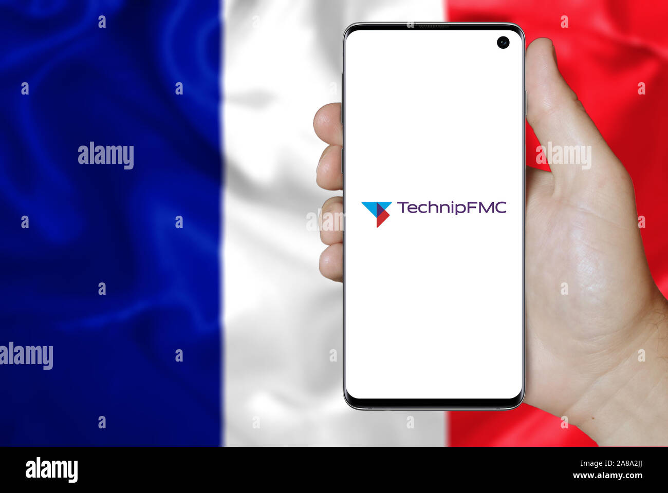 Logo of public company TechnipFMC displayed on a smartphone. Flag of ...