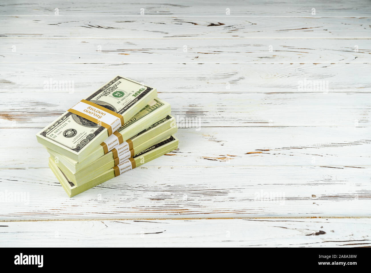 Fifty thousand dollars cash on white rustic background Stock Photo - Alamy