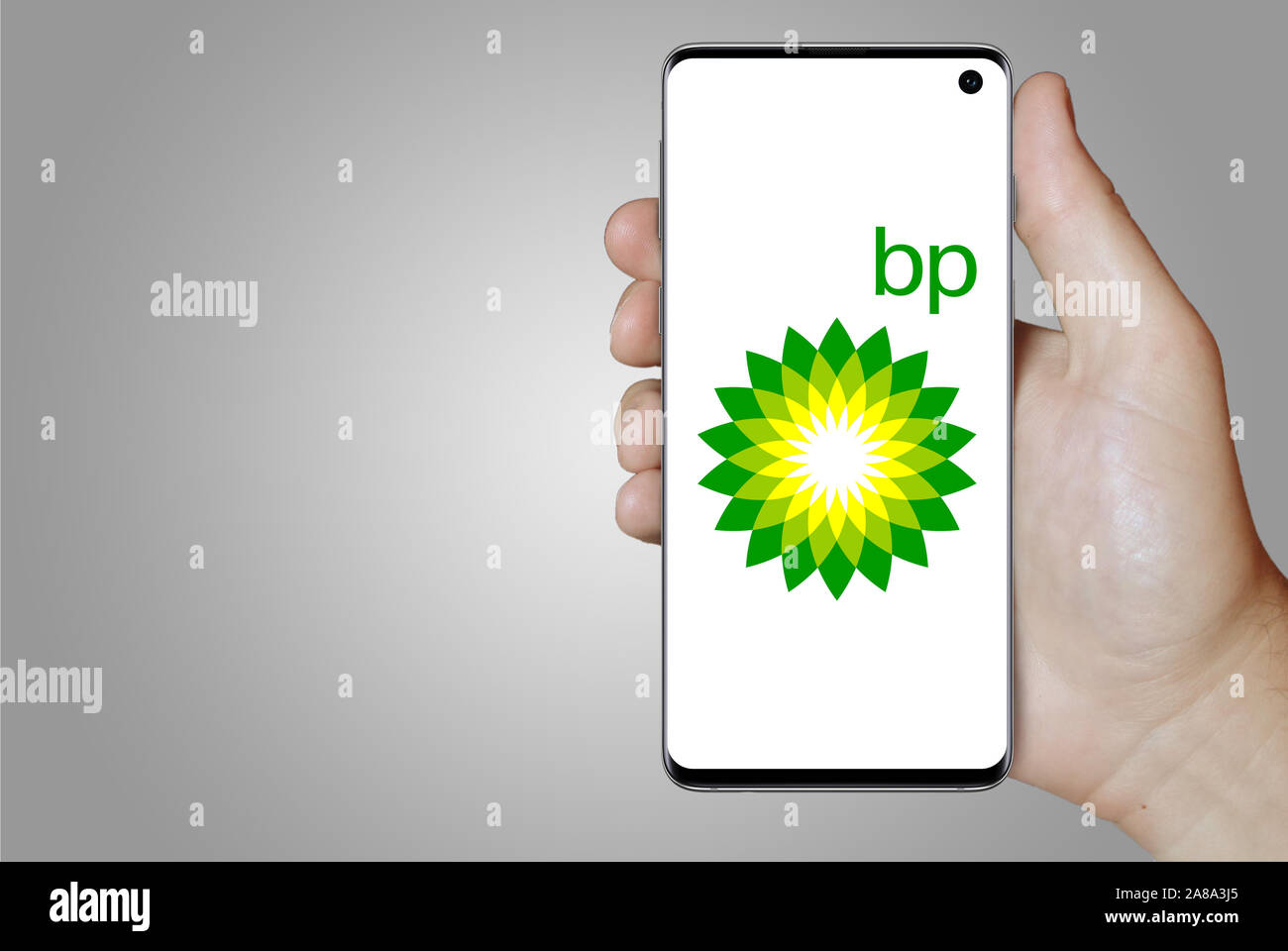 Logo of public company BP displayed on a smartphone. Grey background ...