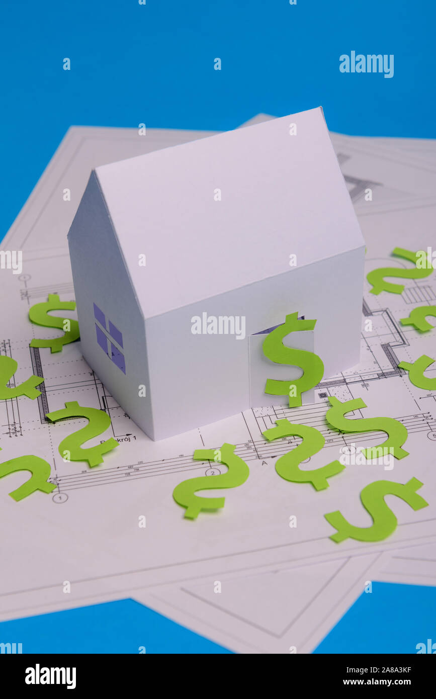 Paper skyscrapers , us dollar money, house projects plan and blueprints ...