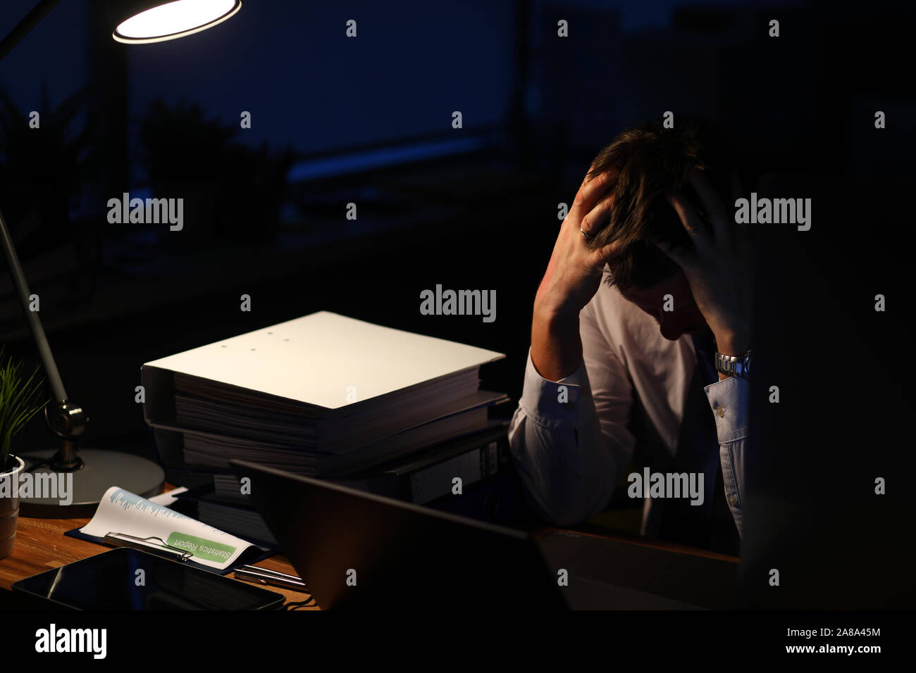 Exhausted business employee Stock Photo - Alamy