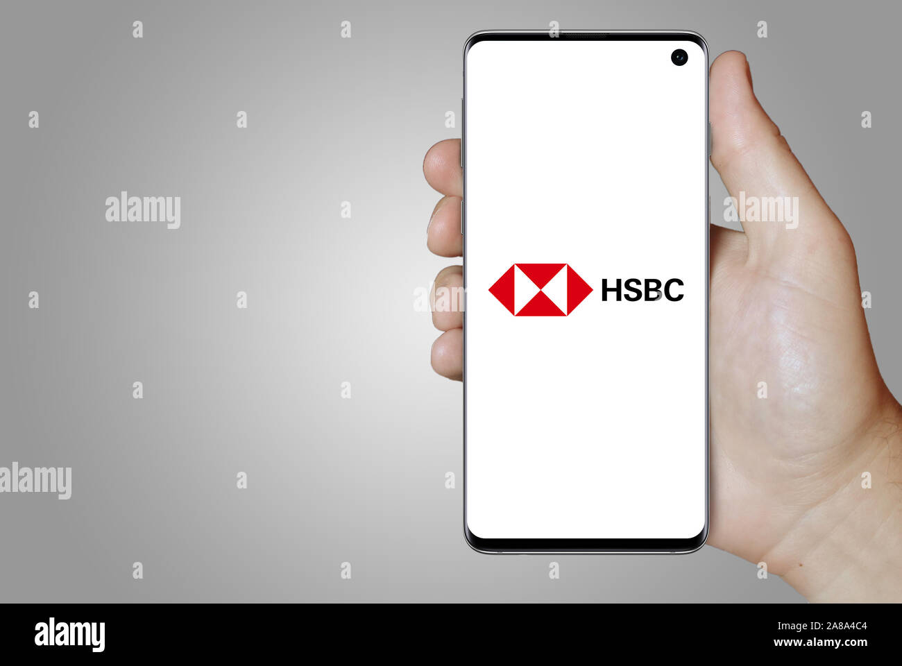 Logo of public company HSBC displayed on a smartphone. Grey background ...