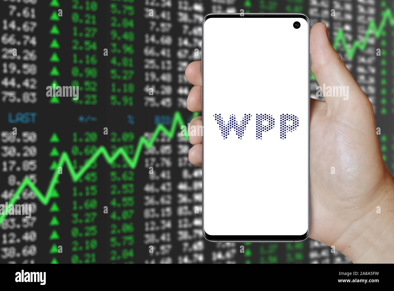 Logo of public company WPP plc displayed on a smartphone. Positive ...
