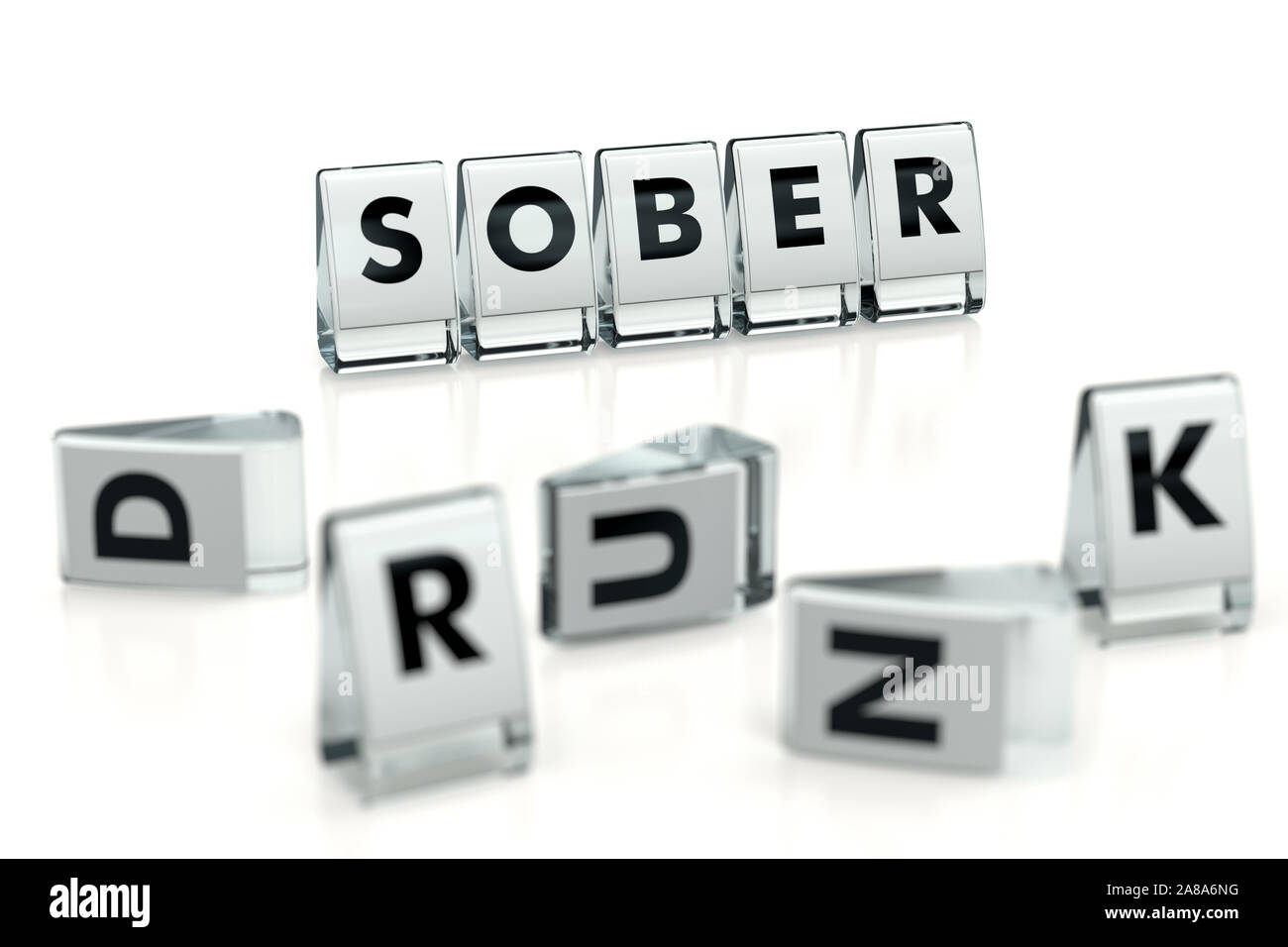SOBER word written on glossy blocks and fallen over blurry blocks with ...