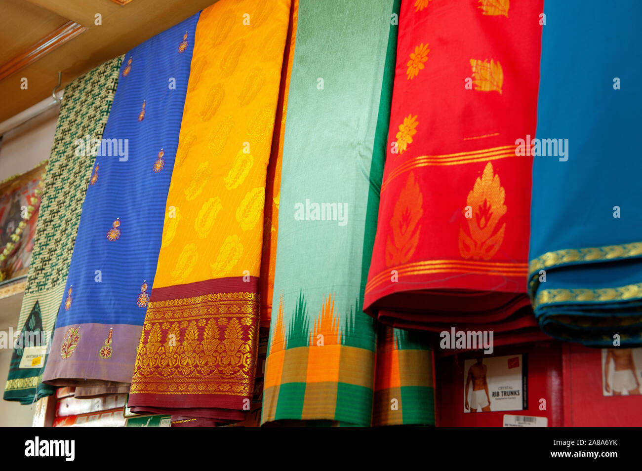 Colorful saris on display for sale at a shop in Bangalore, Karnataka ...