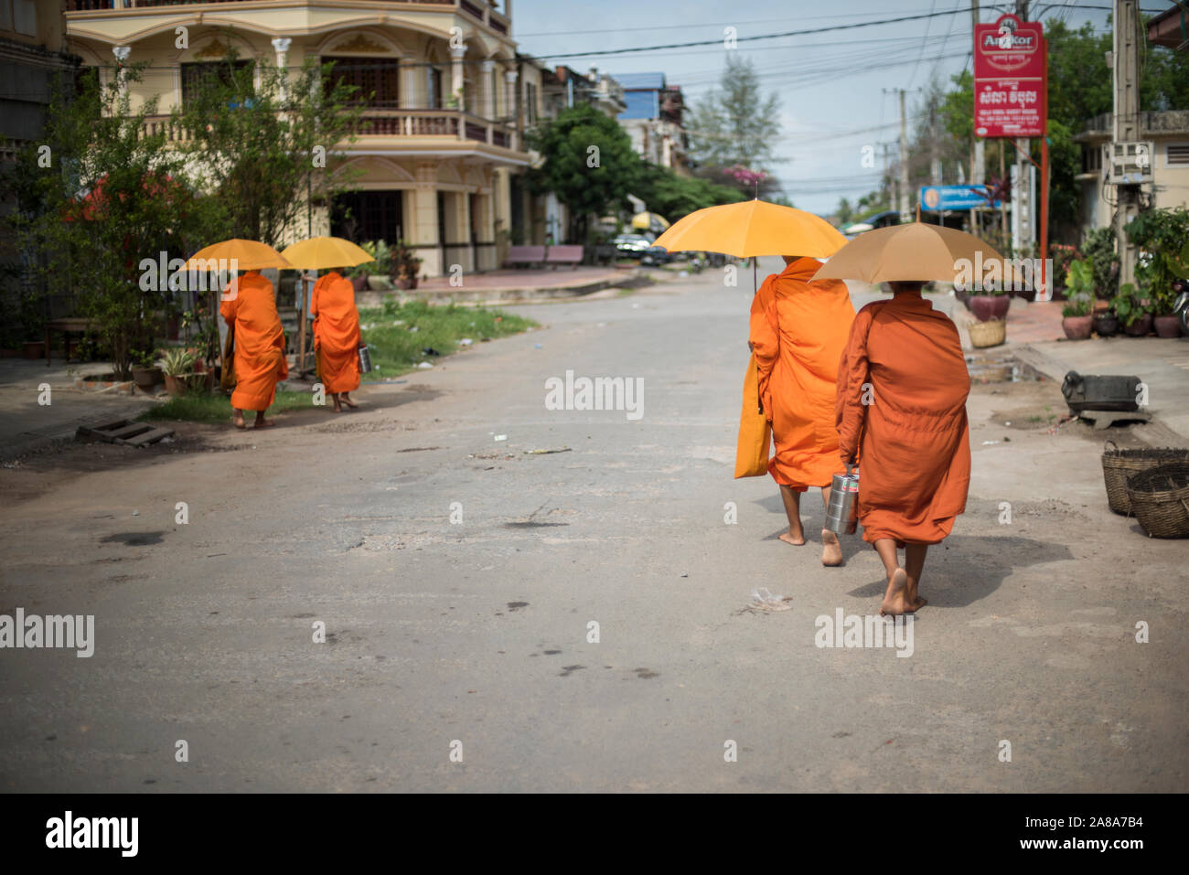 Buddhist monks walking the streets of Kampot, Cambodia Stock Photo - Alamy