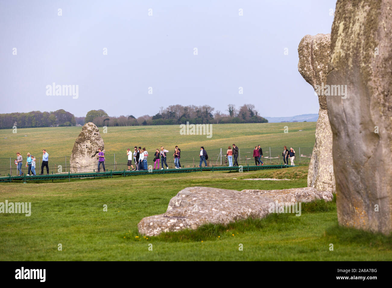 Tourists in Stonehenge, a ring of standing stones, prehistoric monument ...