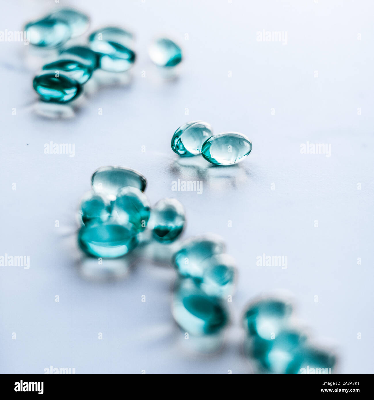 Pharmaceutical, branding and science concept - Blue pills for healthy ...