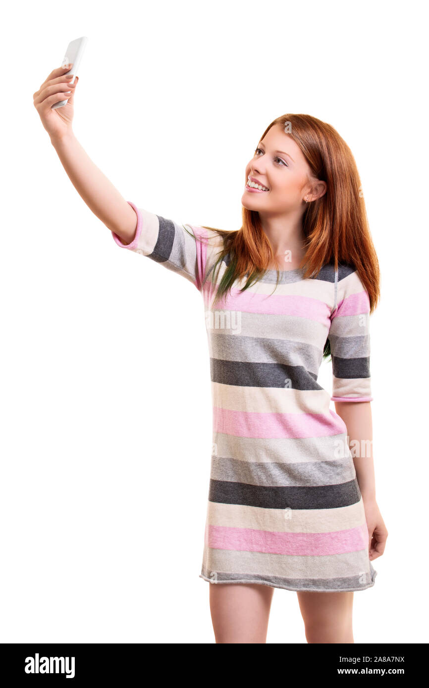 Beautiful smiling fashionable young woman in a casual dress taking a ...