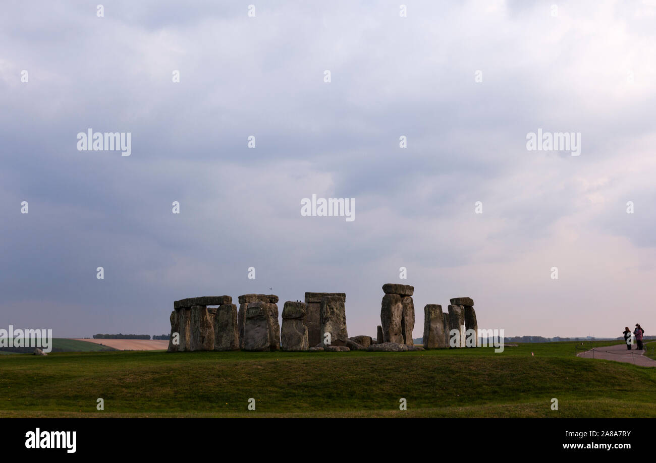 Tourists in Stonehenge, a ring of standing stones, prehistoric monument ...