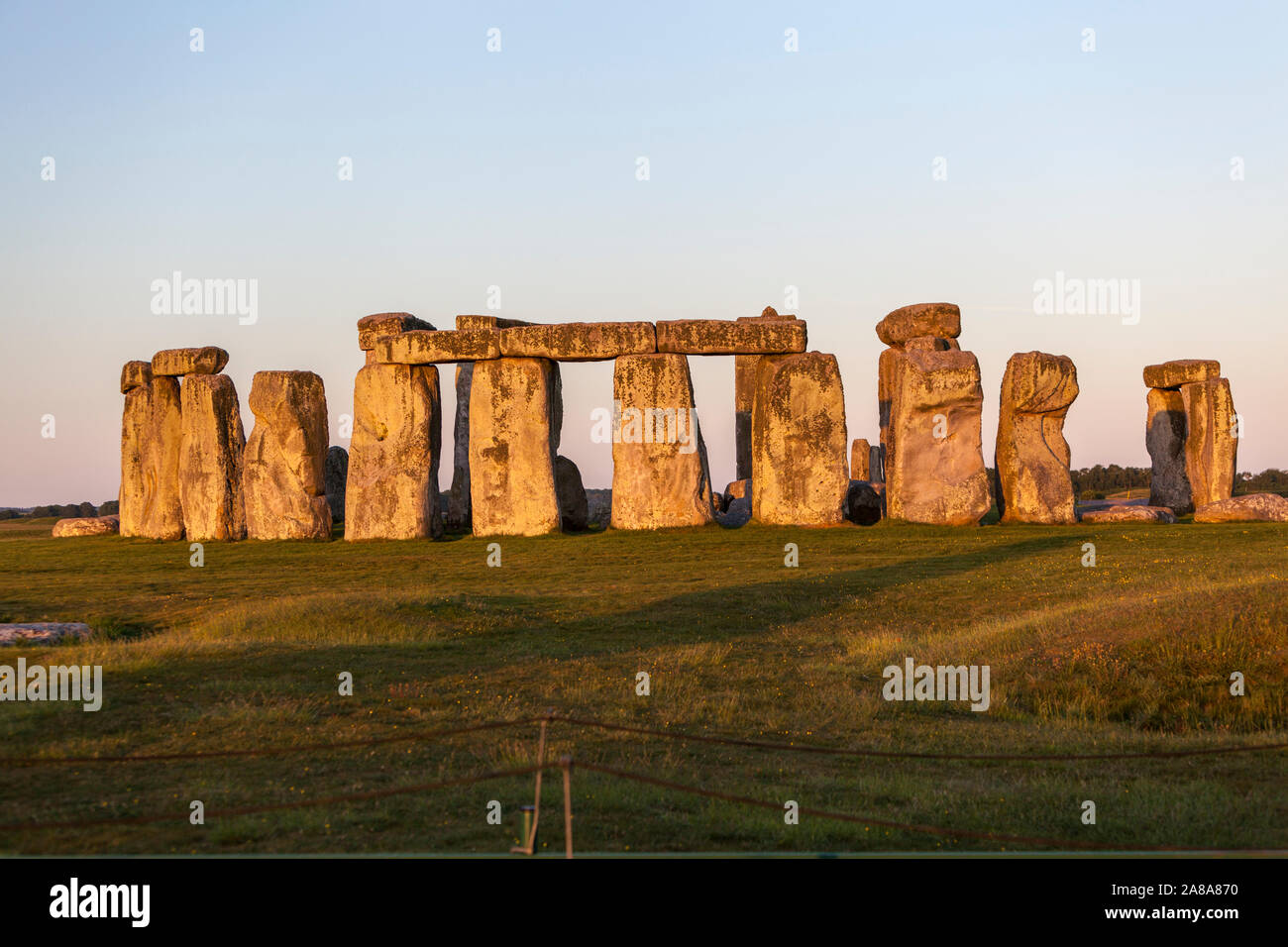Stonehenge at sunset, a ring of standing stones, prehistoric monument ...